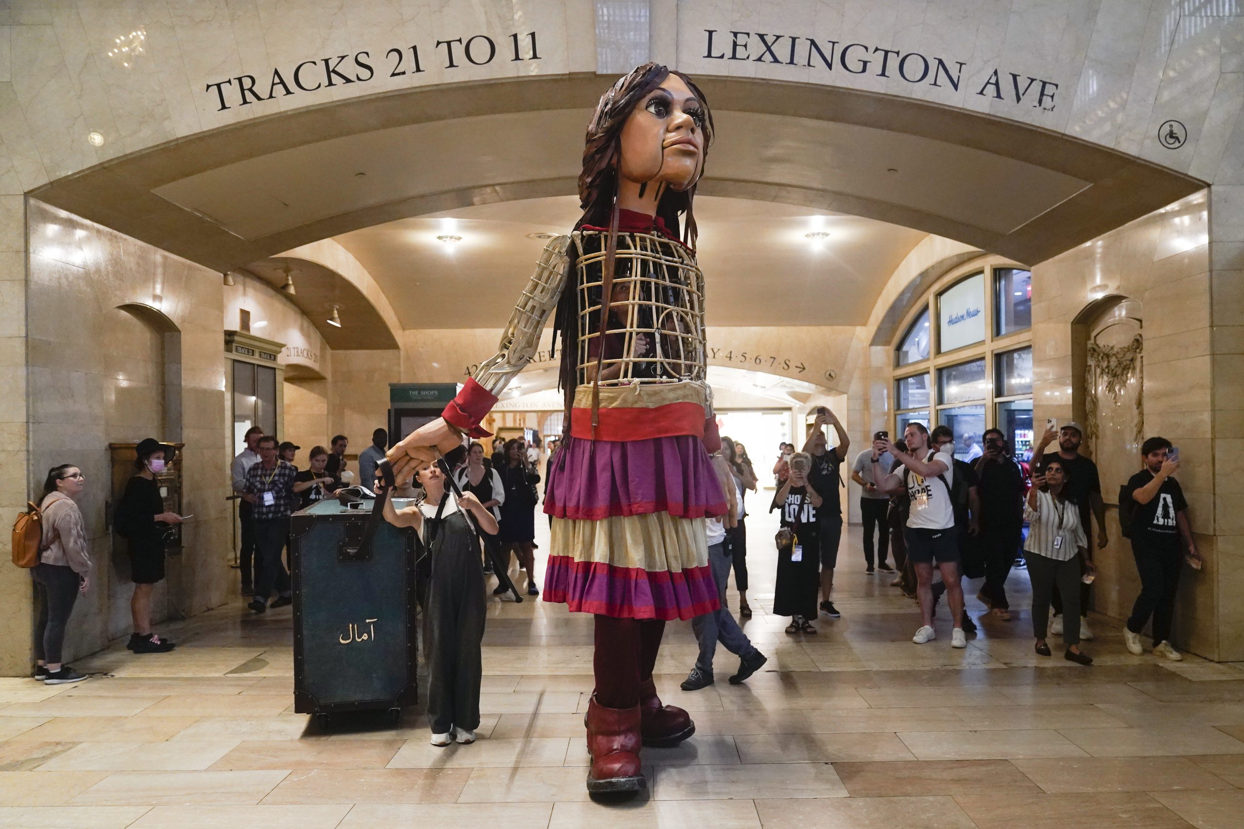 Little Amal, a 12-foot puppet of a Syrian refugee, will travel the US ...