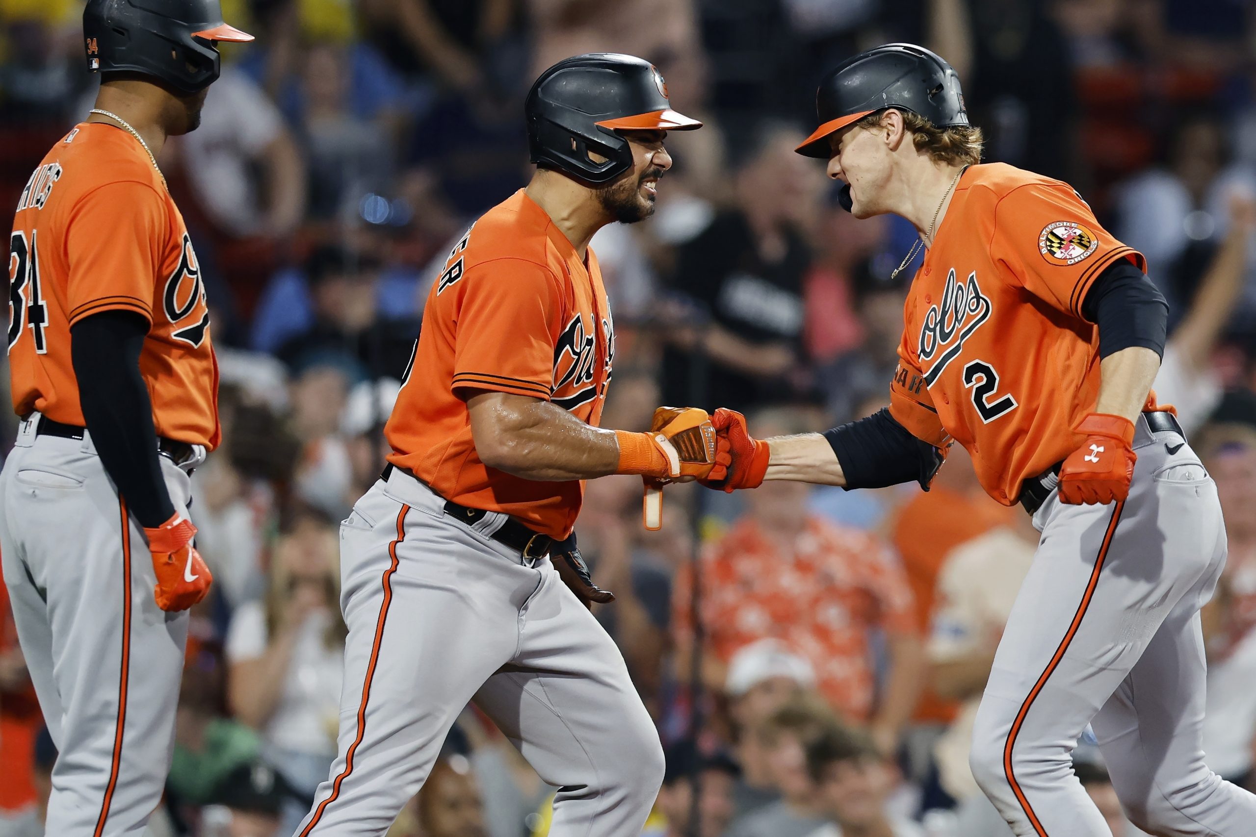 Orioles hang on to beat Red Sox 13-12 for 7th straight win as McCann ...
