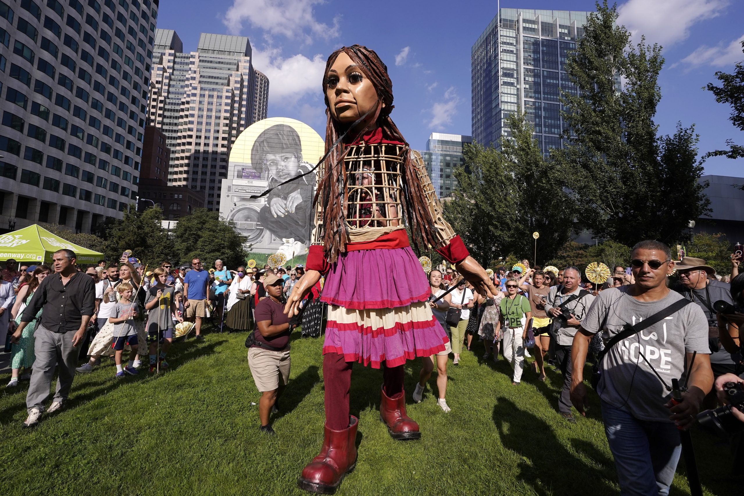 Little Amal, a 12-foot puppet of a Syrian refugee, began its journey ...