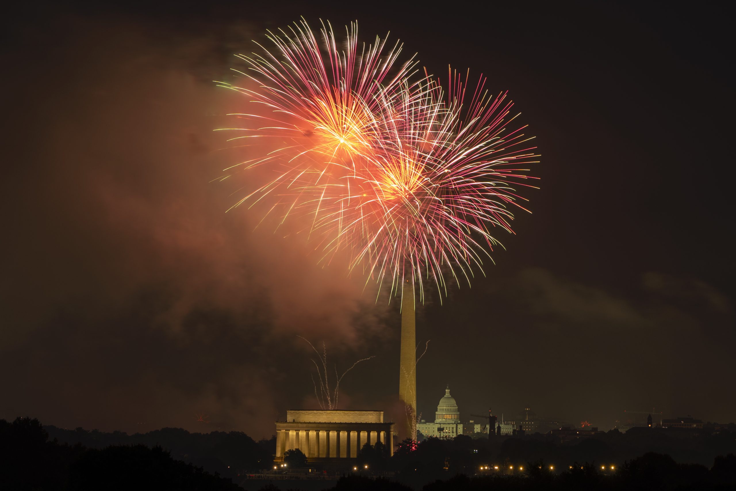 Fireworks light up the skies across the US as Americans endure searing ...